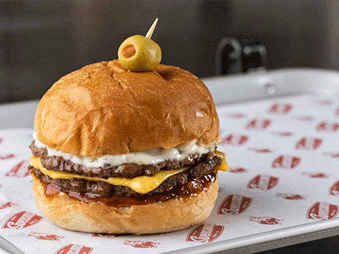 Double Cheeseburger: Meet the legendary Galley Boy &ndash; two perfectly seasoned patties, secret sauces, and that signature olive on top. Worth the pilgrimage!