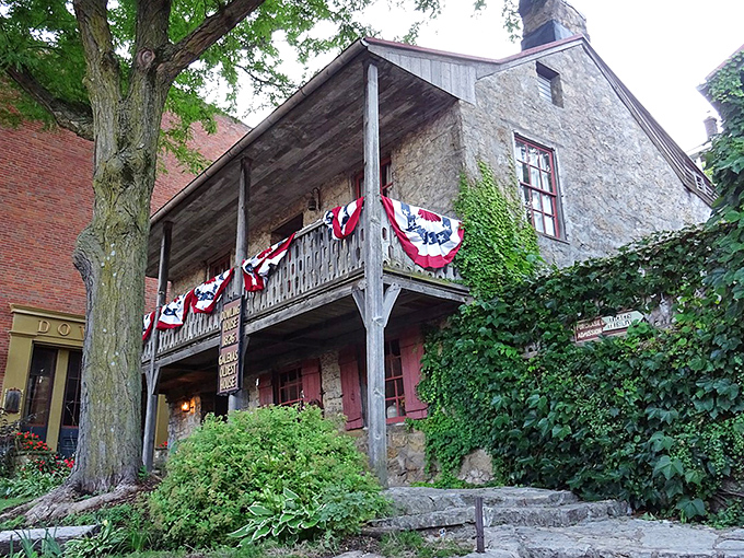 The Dowling House stands defiantly against time, its limestone walls whispering tales of frontier life since 1826.