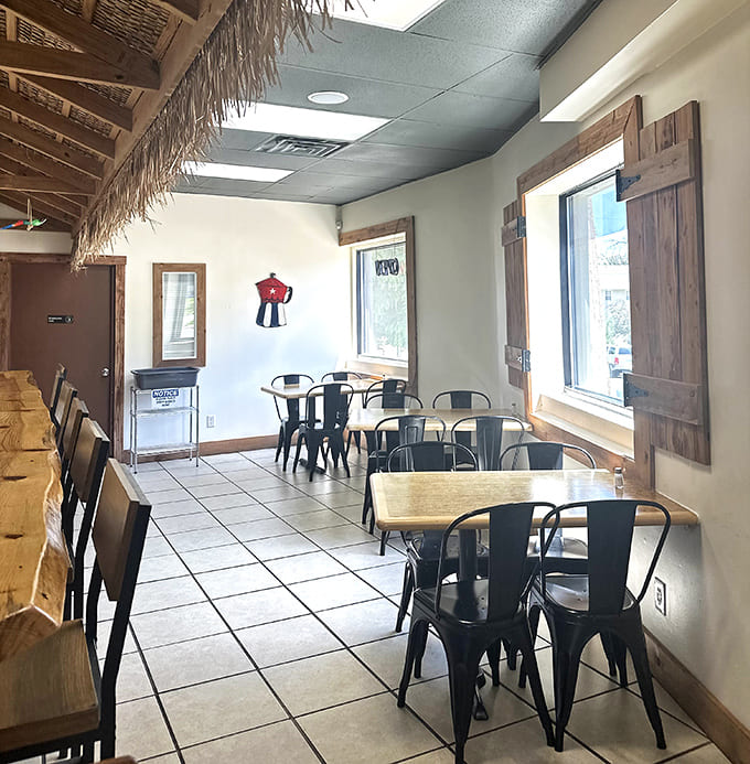 Simple yet inviting, the interior balances rustic wooden elements with thatch accents, creating a casual Caribbean vibe that lets the food shine.