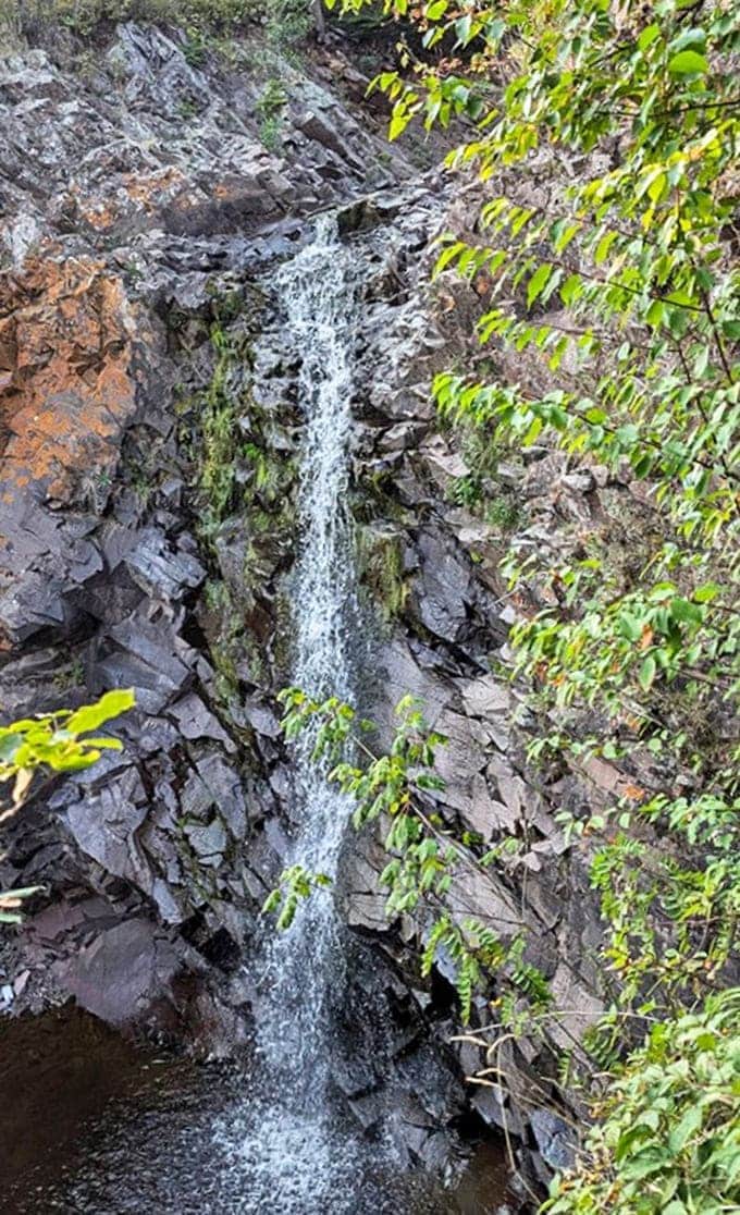 Water dances down ancient volcanic rock, creating a mesmerizing rhythm that's been playing on repeat for thousands of years.
