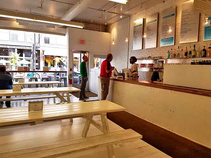 Minimalist charm meets maximum flavor in this bright, airy space where wooden communal tables invite strangers to become friends over Cuban-inspired feasts.