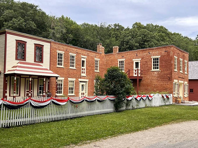 The historic village stands proudly decorated with patriotic bunting &ndash; like your neighbor's house on July 4th, but with authentic historical significance.