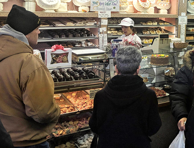 Customers line up eagerly at the counter, where decisions become deliciously difficult and willpower goes to die.
