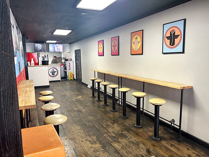 Interior: Simple wooden stools and counter seating create the perfect no-nonsense atmosphere where the food, not the furniture, takes center stage.
