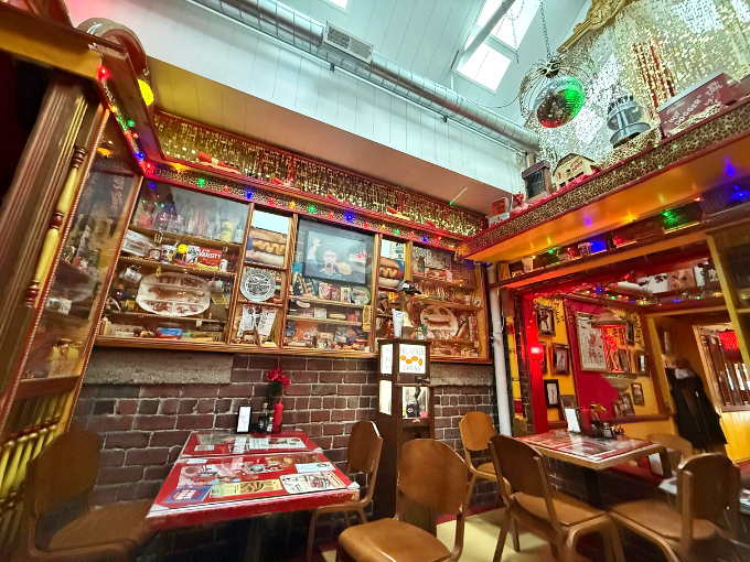 Step inside and you've entered hot dog heaven&mdash;complete with disco ball. This isn't just dining; it's a glittery, memorabilia-packed time machine with tables.