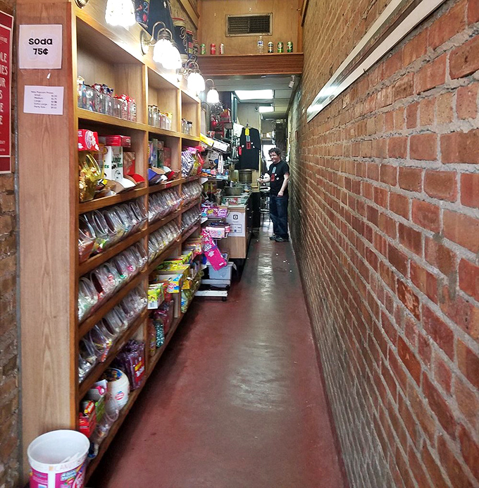 Navigating this deliciously narrow corridor requires the skill of a tightrope walker and the patience of someone who knows treasure awaits at every turn.