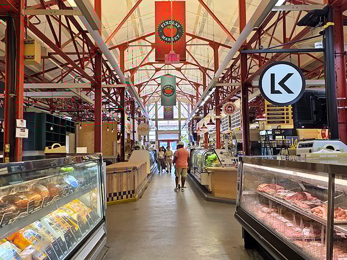Sunlight streams through the market's historic framework, illuminating a gastronomic wonderland where vendors and shoppers create a daily food ballet.