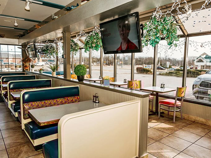 Cozy booths line the windows, offering the perfect spot to watch the world go by while enjoying a hearty meal.