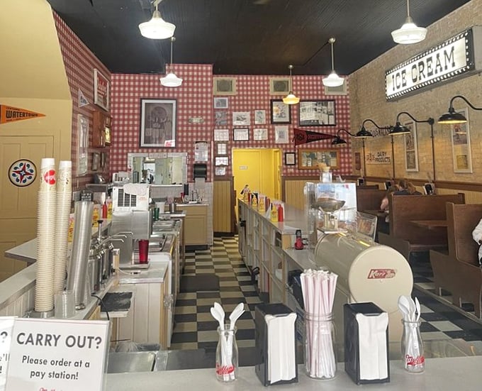 Step inside to a time capsule of Americana &ndash; red checkered walls, classic counter service, and the promise of Wisconsin's finest dairy delights.