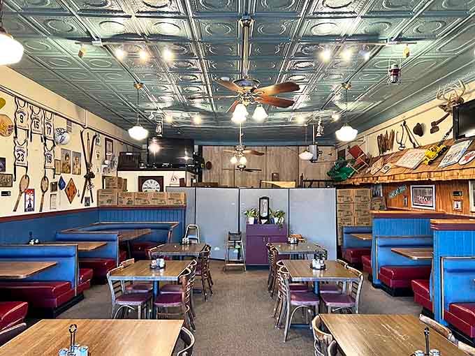 Pressed tin ceilings, cozy booths, and wood paneling create that perfect "been-here-forever" vibe that makes you instantly feel like a regular.