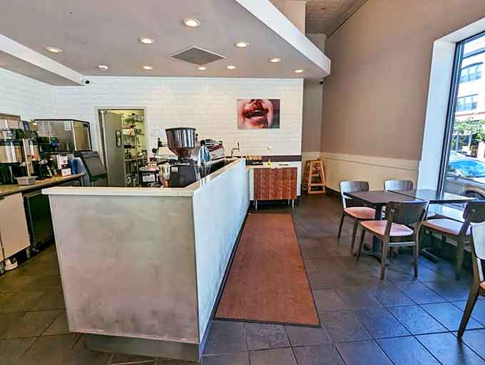 Minimalist chic meets pastry perfection inside, where white subway tiles and concrete counters create the perfect backdrop for buttery masterpieces.
