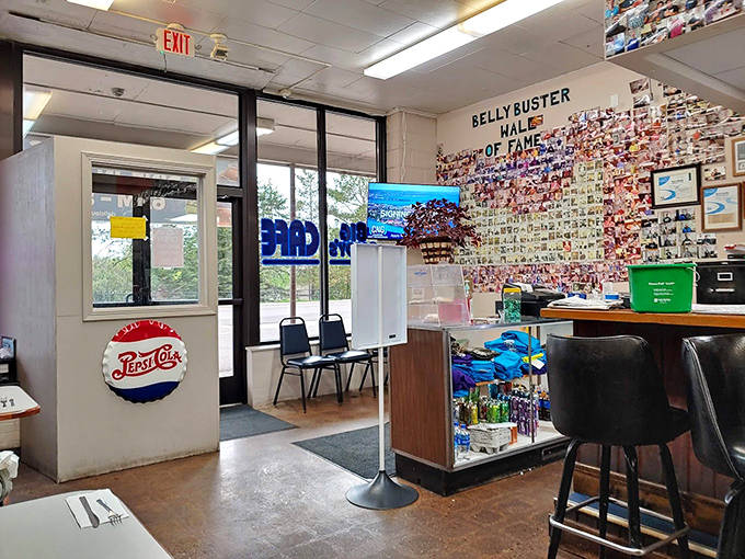 Warm lighting, rustic wood tables, and whimsical farm animal artwork create the perfect backdrop for serious barbecue business.