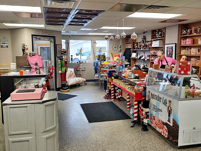 Whimsical ceiling tiles and nutcracker-lined shelves transform a simple cafe into a year-round celebration where breakfast dreams come true.
