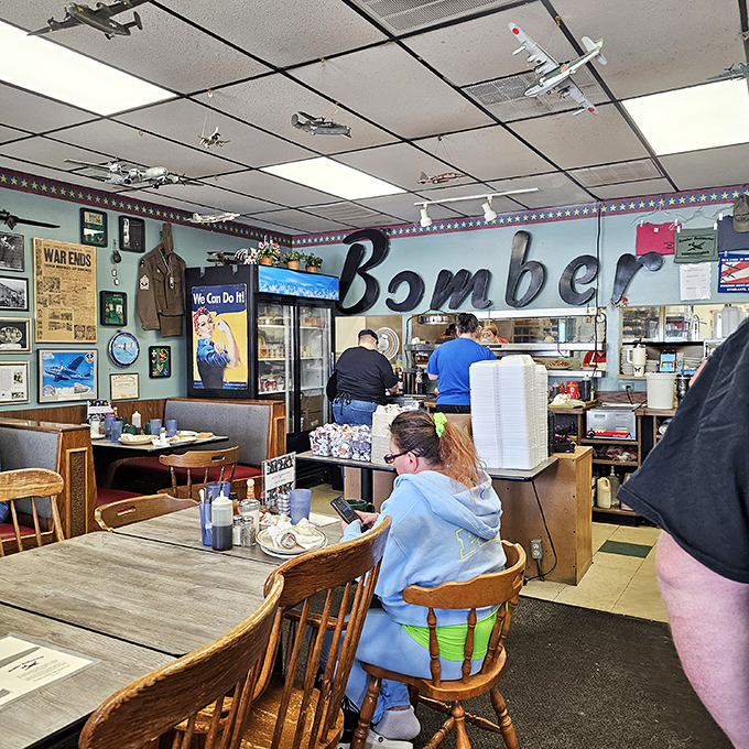 Step inside and you're immediately transported to another era &ndash; model planes soar overhead while diners below fuel up for their own daily missions.