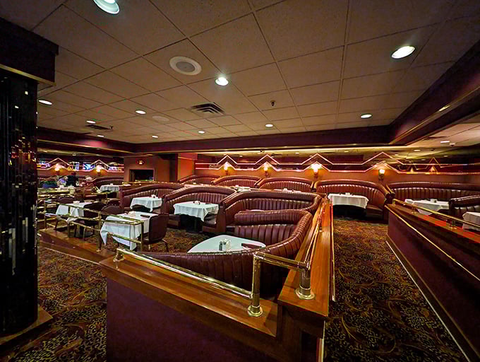 Step inside to discover plush burgundy booths and classic steakhouse ambiance &ndash; dining rooms that whisper stories of celebrations past.