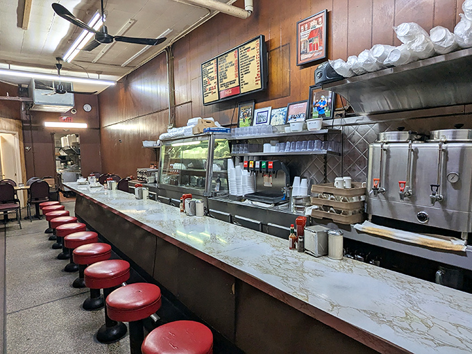 Counter culture at its finest &ndash; the heart of Duly's where strangers become friends over coffee and those signature red stools have supported generations.