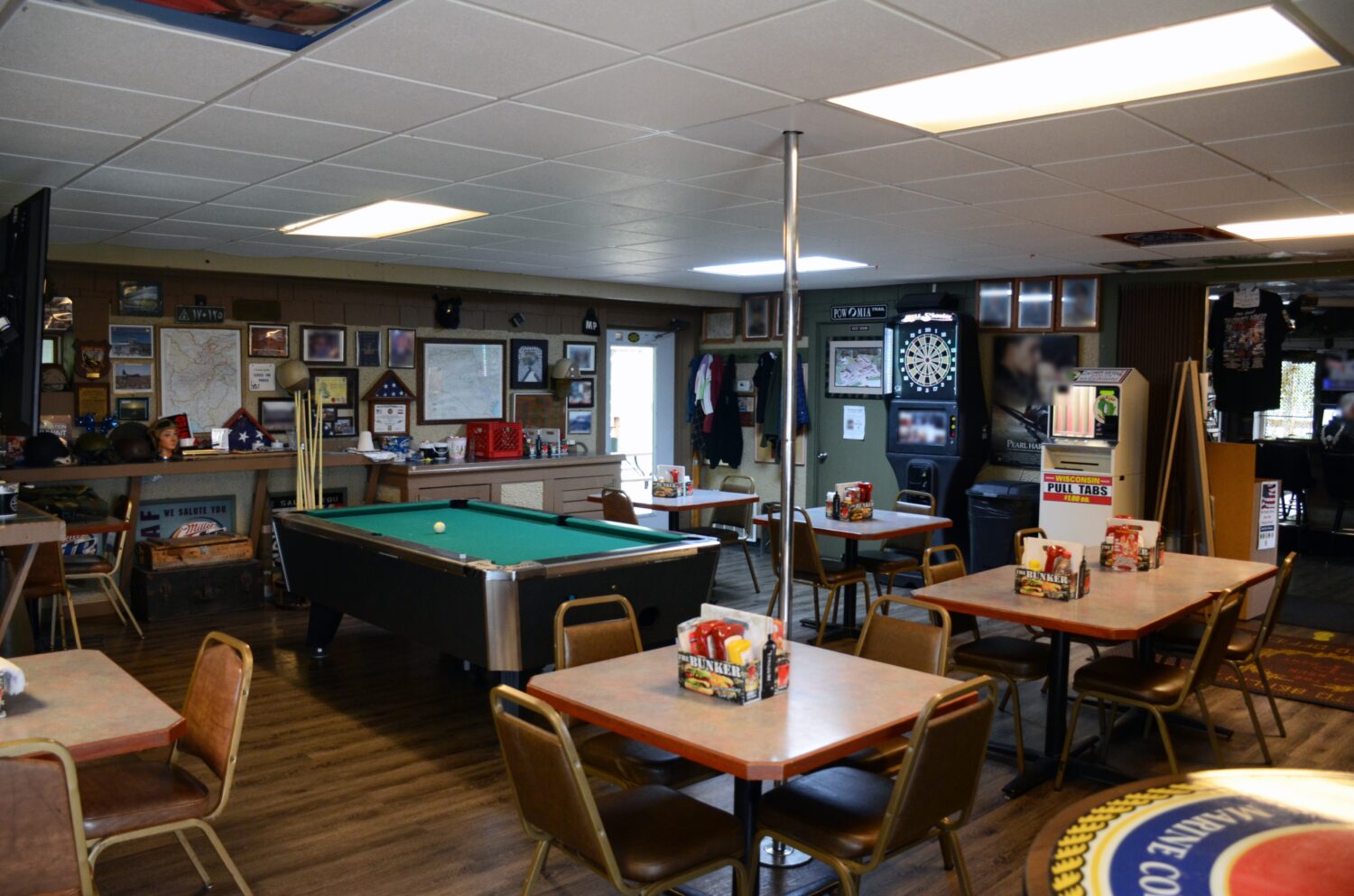 Step inside to discover a treasure trove of military memorabilia, where pool tables and dart boards share space with maps and medals from conflicts past.