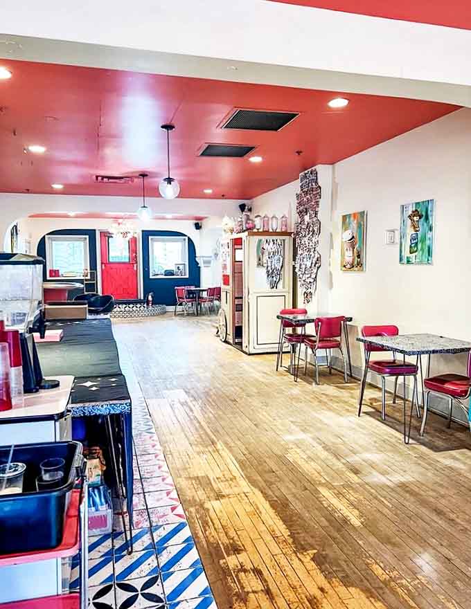 Step inside to discover a wonderland of vintage charm &ndash; red ceiling, wooden floors, and retro furniture create the perfect backdrop for sugar-fueled conversations.