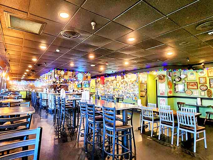 String lights twinkle above mismatched tables where barbecue dreams come true &ndash; comfort and kitsch in perfect harmony.