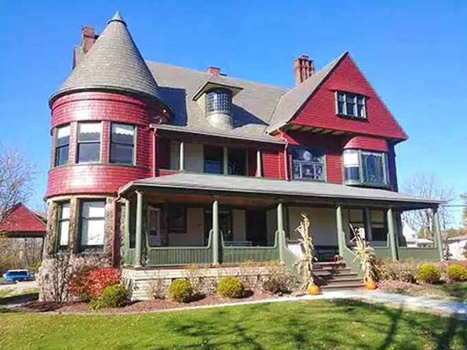 The McDowell-Phillips House Museum stands as a crimson Victorian masterpiece, its distinctive turret and wrap-around porch whispering stories of Medina's prosperous past.