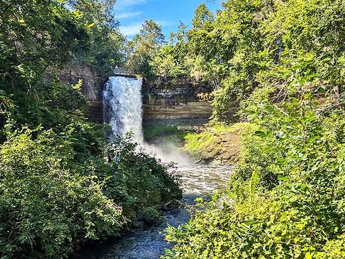 The falls transform with each season, from thundering spring torrents to this summer spectacle that draws visitors from across the city.
