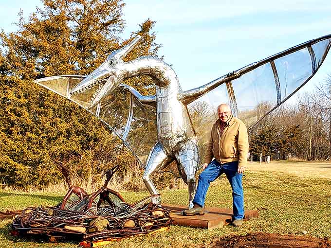 This magnificent metallic dragon soars with imagination, its wings crafted from satellite dishes and body assembled from countless recycled parts.