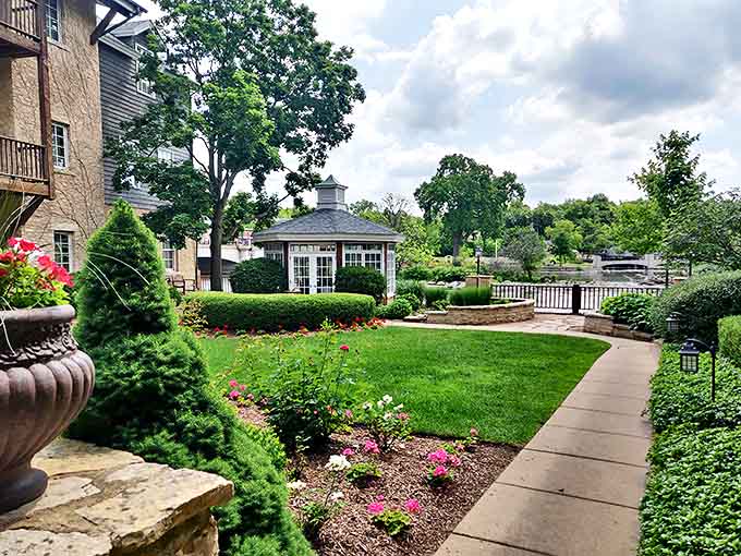 A meticulously maintained garden path leads to a charming gazebo, where countless marriage proposals have unfolded amid seasonal blooms.