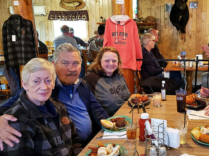 Inside the belly of the beast, warm wood paneling and rustic charm create a cozy northwoods atmosphere that feels quintessentially Minnesotan.