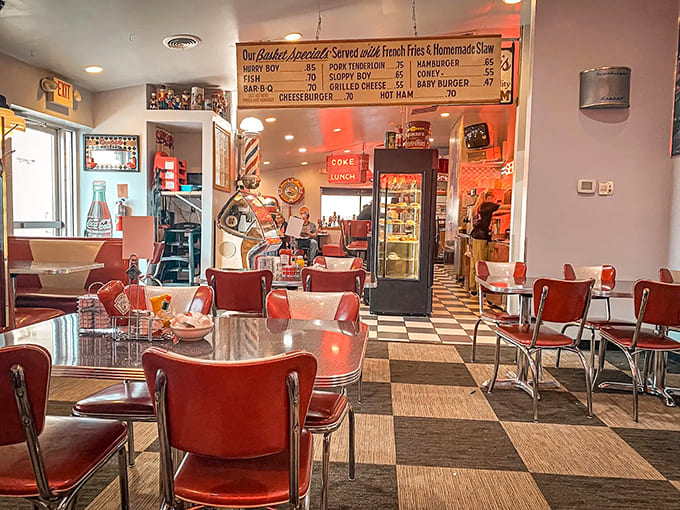 Red vinyl and checkerboard floors create the perfect backdrop for memory-making, where every booth tells a story and every meal feels like coming home.