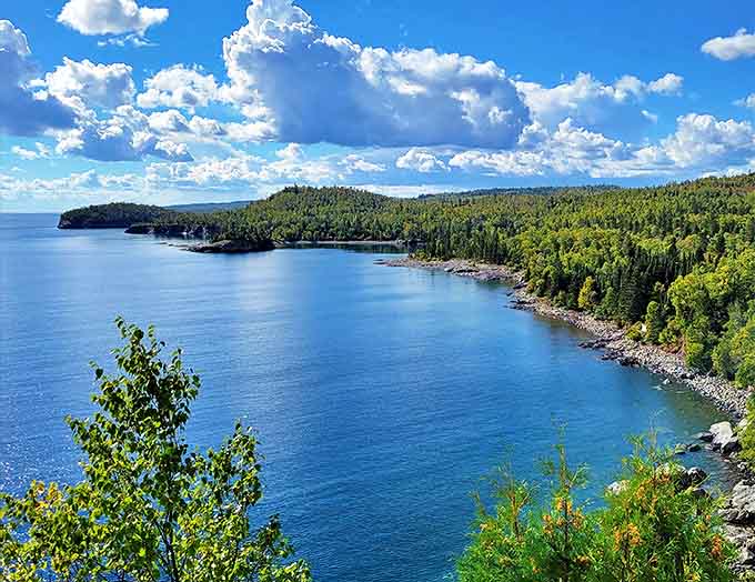Lake Superior stretches to the horizon in fifty shades of blue, making you wonder why anyone would ever vacation anywhere else.