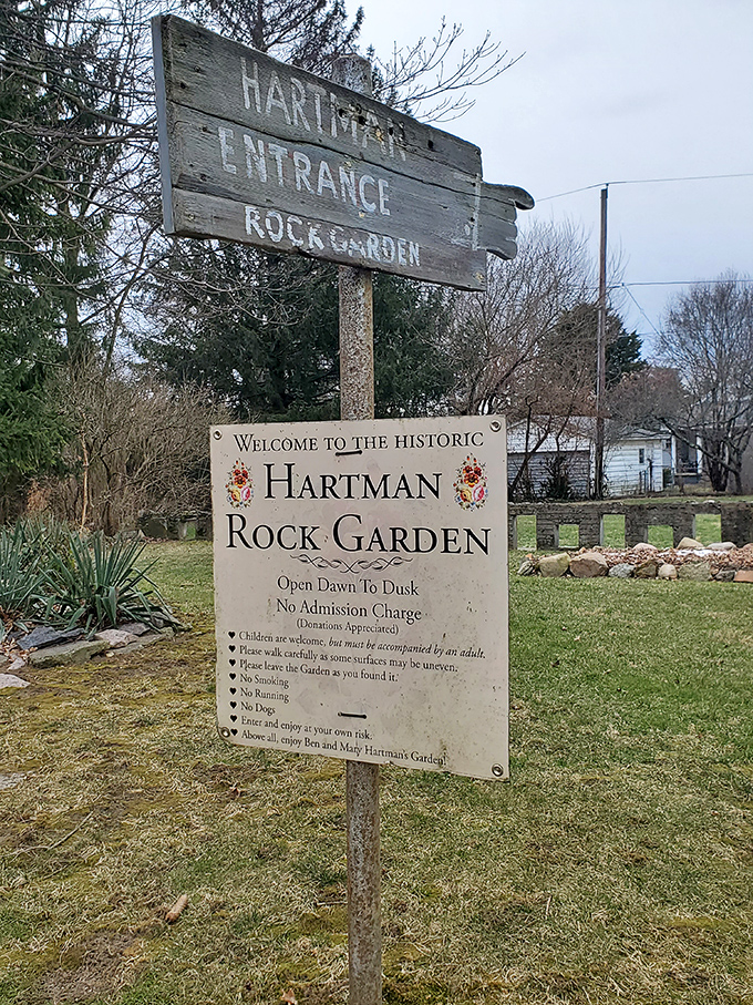 The weathered entrance sign welcomes visitors to this hidden gem in Springfield, Ohio &ndash; free to visit but rich with wonder.