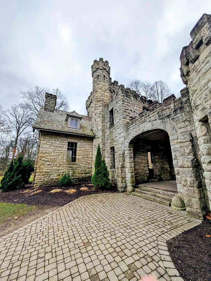 The grand entrance beckons visitors with its imposing stonework and arched gateway, like a portal to Ohio's own medieval realm.