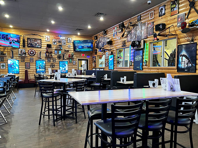 Wood-paneled walls adorned with movie memorabilia create an atmosphere where film buffs can feast their eyes while satisfying their appetites.