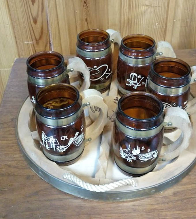 These aren't just mugs &ndash; they're storytellers with handles, each wooden vessel having toasted countless memories before finding their way to this rustic display.