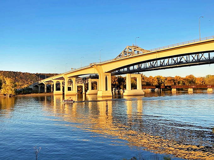 The historic Winona Bridge spans the mighty Mississippi, connecting two states while offering sunset views that stop traffic &ndash; literally.