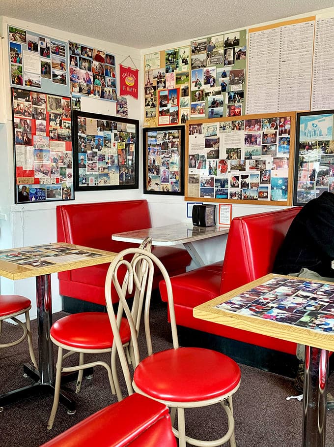 Those red booths and photo-covered walls create the perfect cozy atmosphere for contemplating your next donut choice.