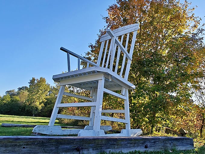 Autumn's golden palette creates the perfect backdrop for this oversized porch fixture, like Mother Nature herself decorated for a giant's seasonal photoshoot.