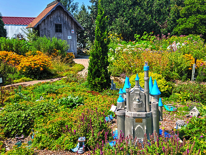 Whimsy meets horticulture with this fairy-tale castle nestled among vibrant blooms &ndash; even Cinderella would consider downsizing for this view.
