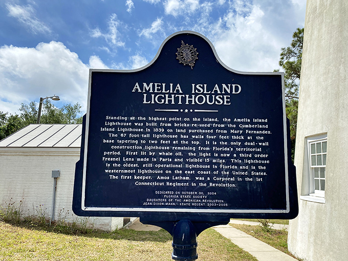 History etched in blue &ndash; this marker reveals the lighthouse's fascinating journey from Georgia to Florida, brick by determined brick.