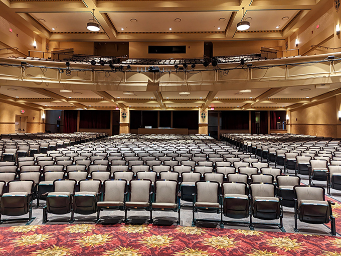Rows of comfortable seating face a stage that has hosted nearly a century of performances, each chair seemingly holding stories of audiences past.
