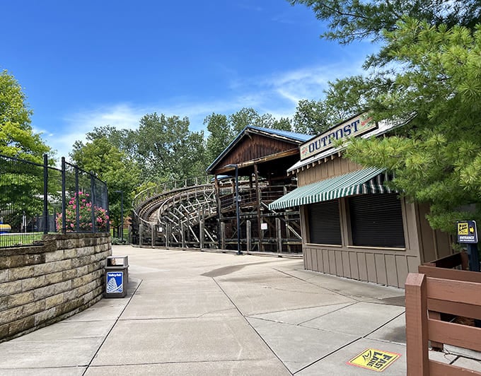 Inside the amusement park: The Outpost wooden coaster invites brave souls to experience old-school thrills with its timeless rattling charm and gravity-defying drops.