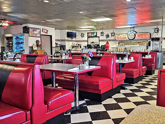 Red vinyl booths and checkerboard floors create the perfect backdrop for comfort food conversations and nostalgic nibbling.