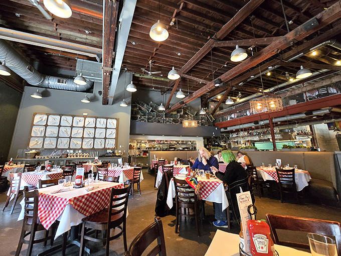 High wooden beams and red-checkered tablecloths create that perfect "serious about seafood, not about ourselves" vibe that makes dining here so comfortable.