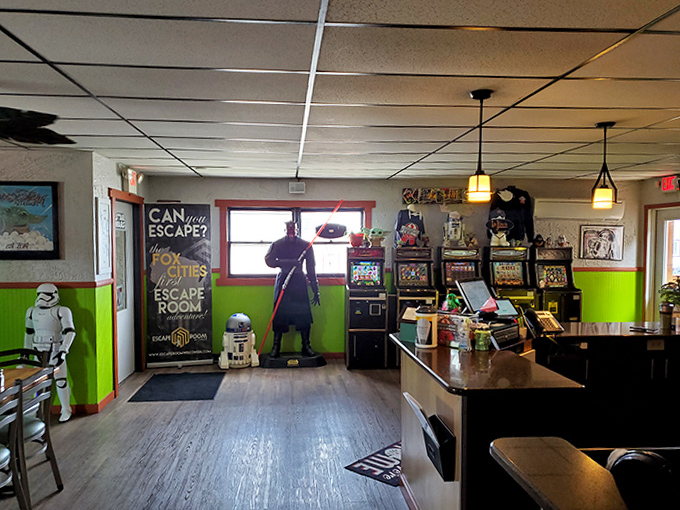 Step inside and you're transported to another galaxy – complete with arcade games and Star Wars figures standing guard.