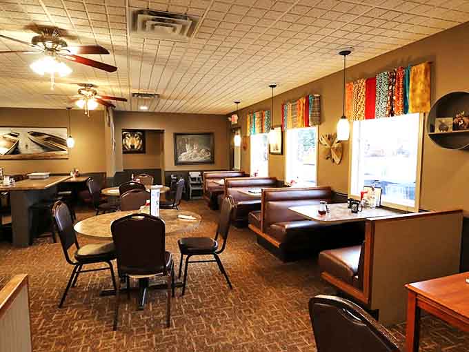 No-frills interior with a bright red counter that says it all: here, it's about the food, not the fancy. String lights add a touch of warmth to this barbecue sanctuary.