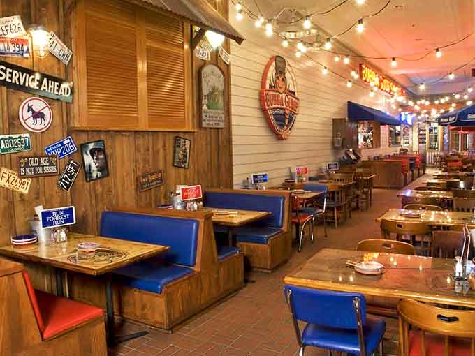 Blue vinyl booths and wooden tables create that perfect "Southern shrimp shack meets Hollywood" vibe that makes you want to settle in for hours.