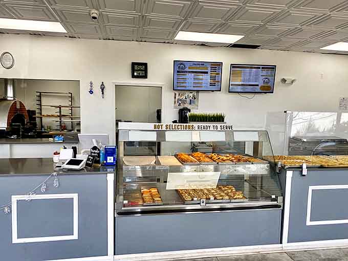 Behind this unassuming counter lies a world of Middle Eastern baking magic, where every tray tells a delicious story.