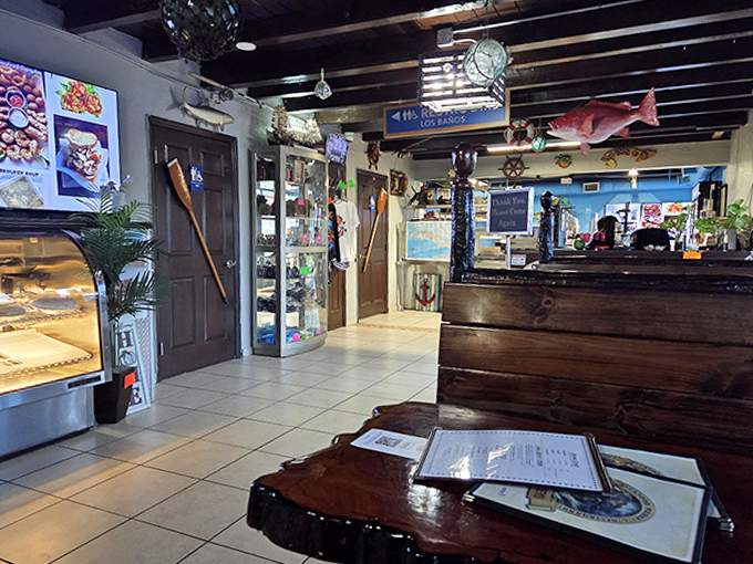 Nautical charm meets seafood serious business inside, where mounted fish and wooden accents create an atmosphere of authentic Keys dining.