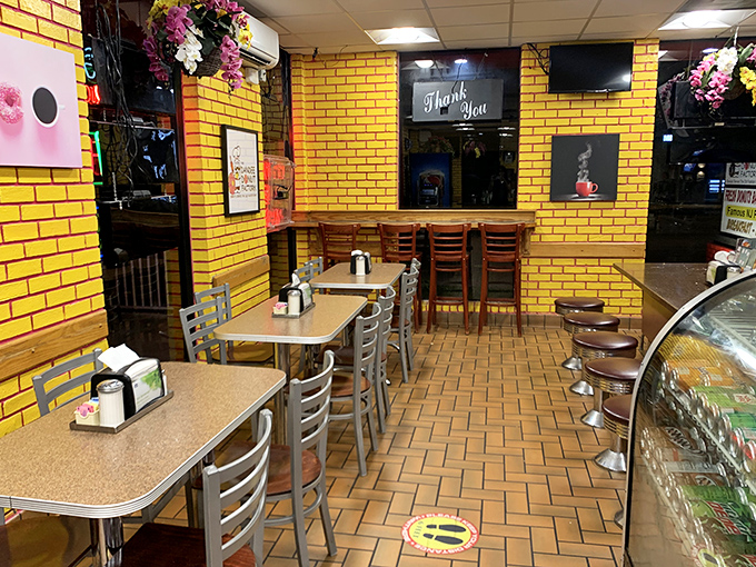 Sunny yellow brick walls create the perfect backdrop for morning conversations and coffee refills at this local institution.