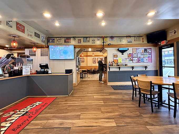 Inside, the warm interior welcomes visitors with comfortable seating and an atmosphere that invites you to linger over coffee and conversation.